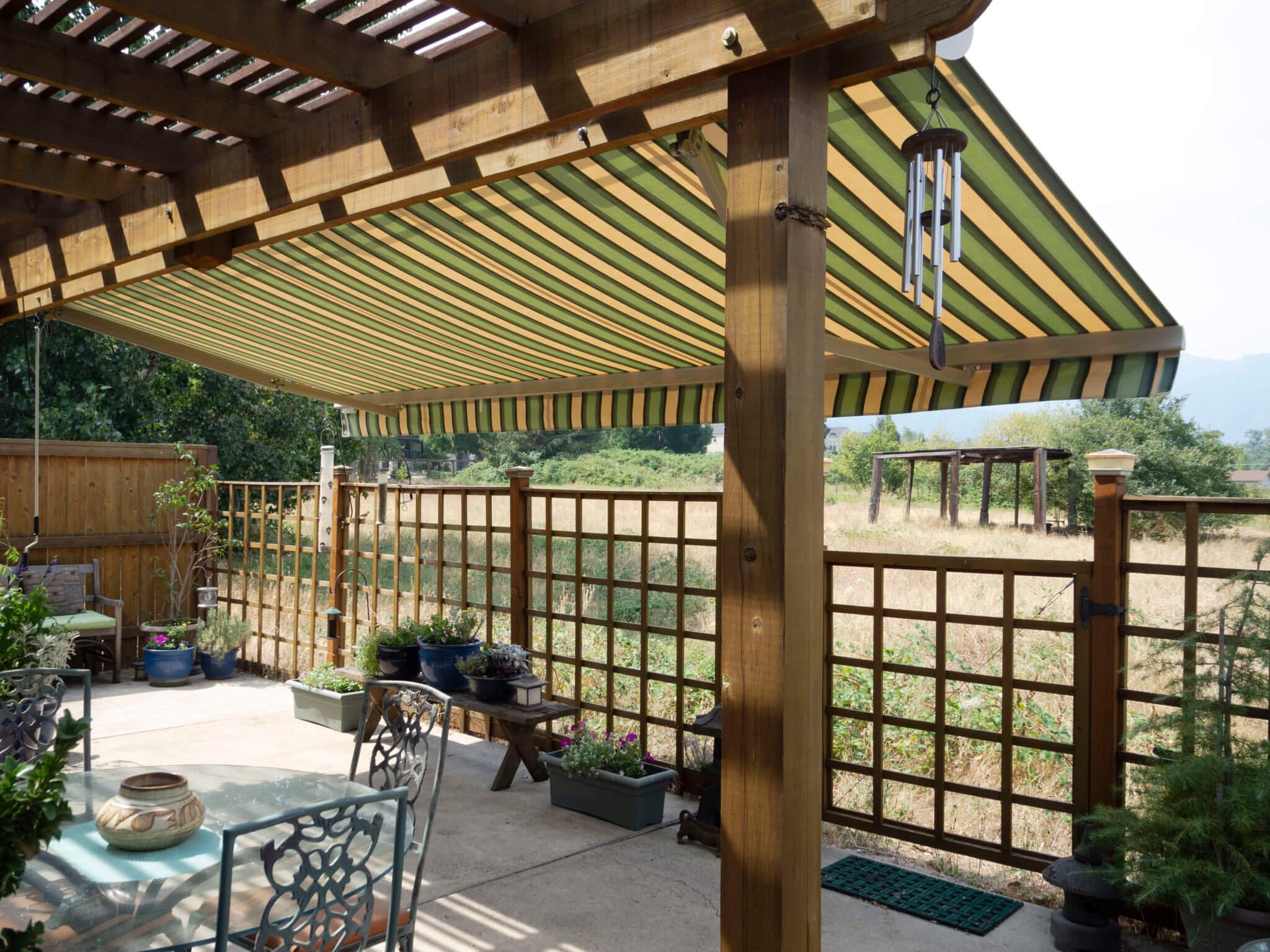 Create an Outdoor Living Space with Retractable Solar Screens